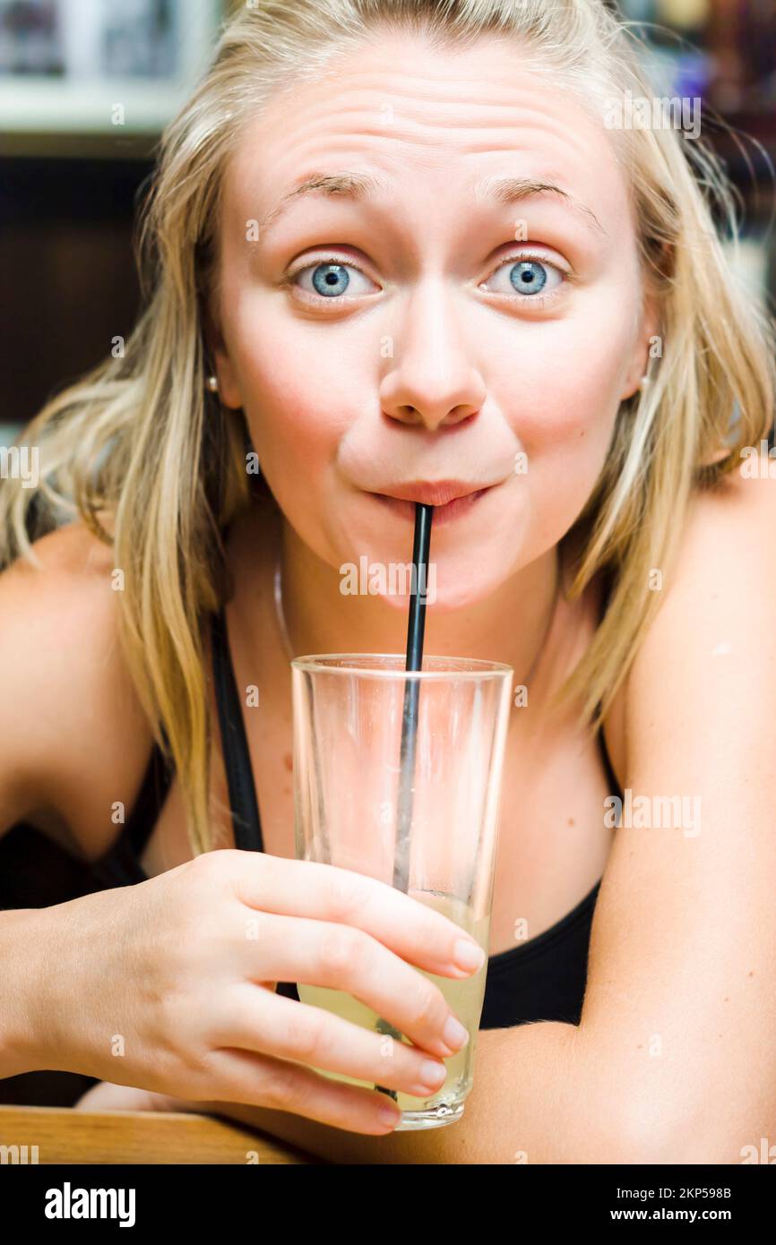Drinking lemon through straw hi-res stock photography and images - Alamy