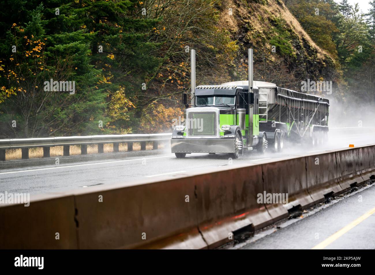 Black and green classic big rig bonnet semi truck with chrome parts and ...