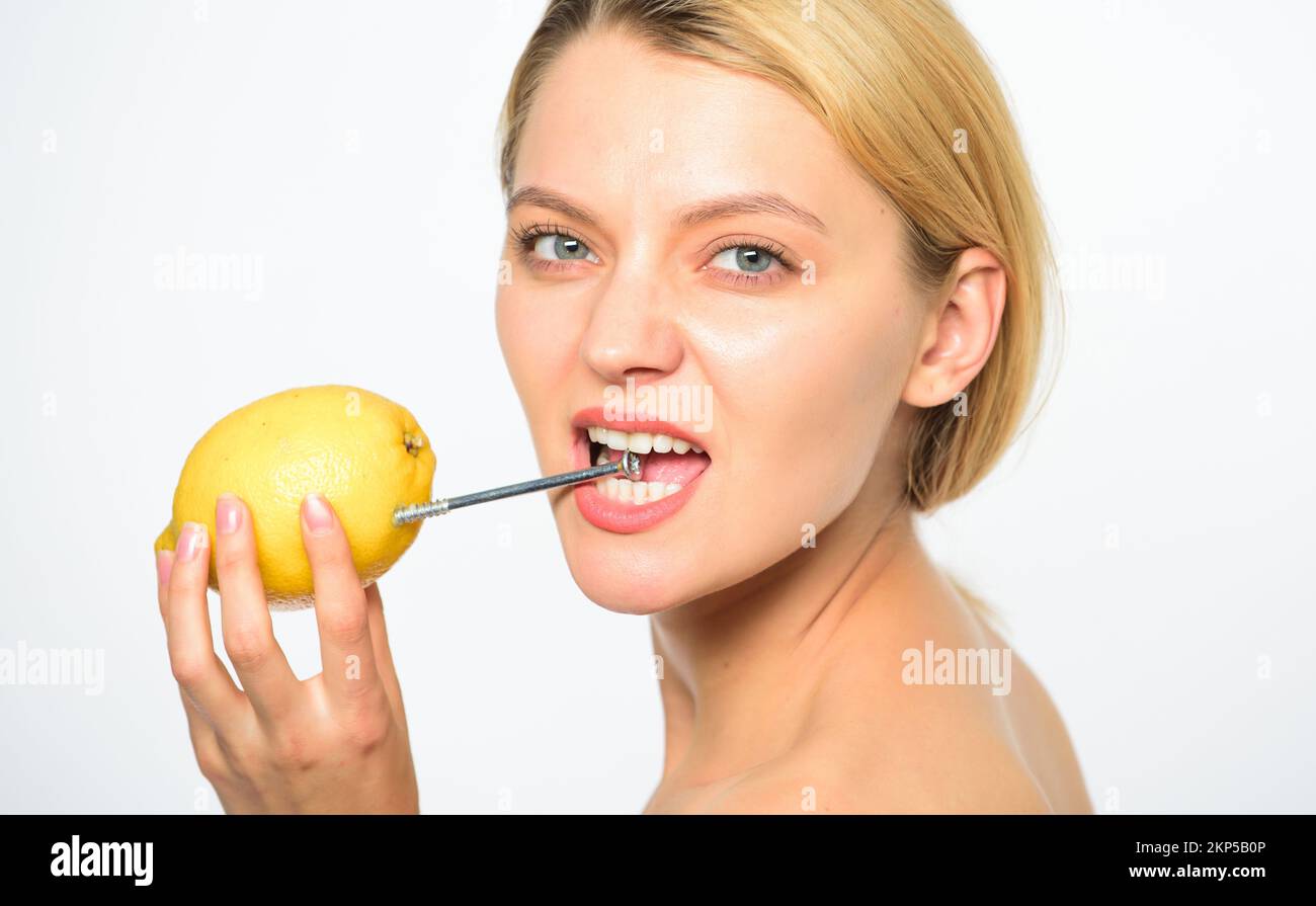 Battery concept. Nutritious drink fill with energy. Lemon with hobnail ...