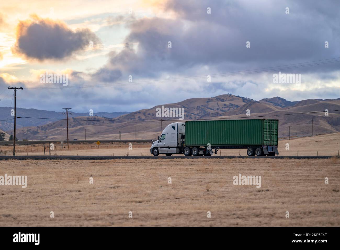 Powerful white big rig classic long haul semi truck tractor with high ...