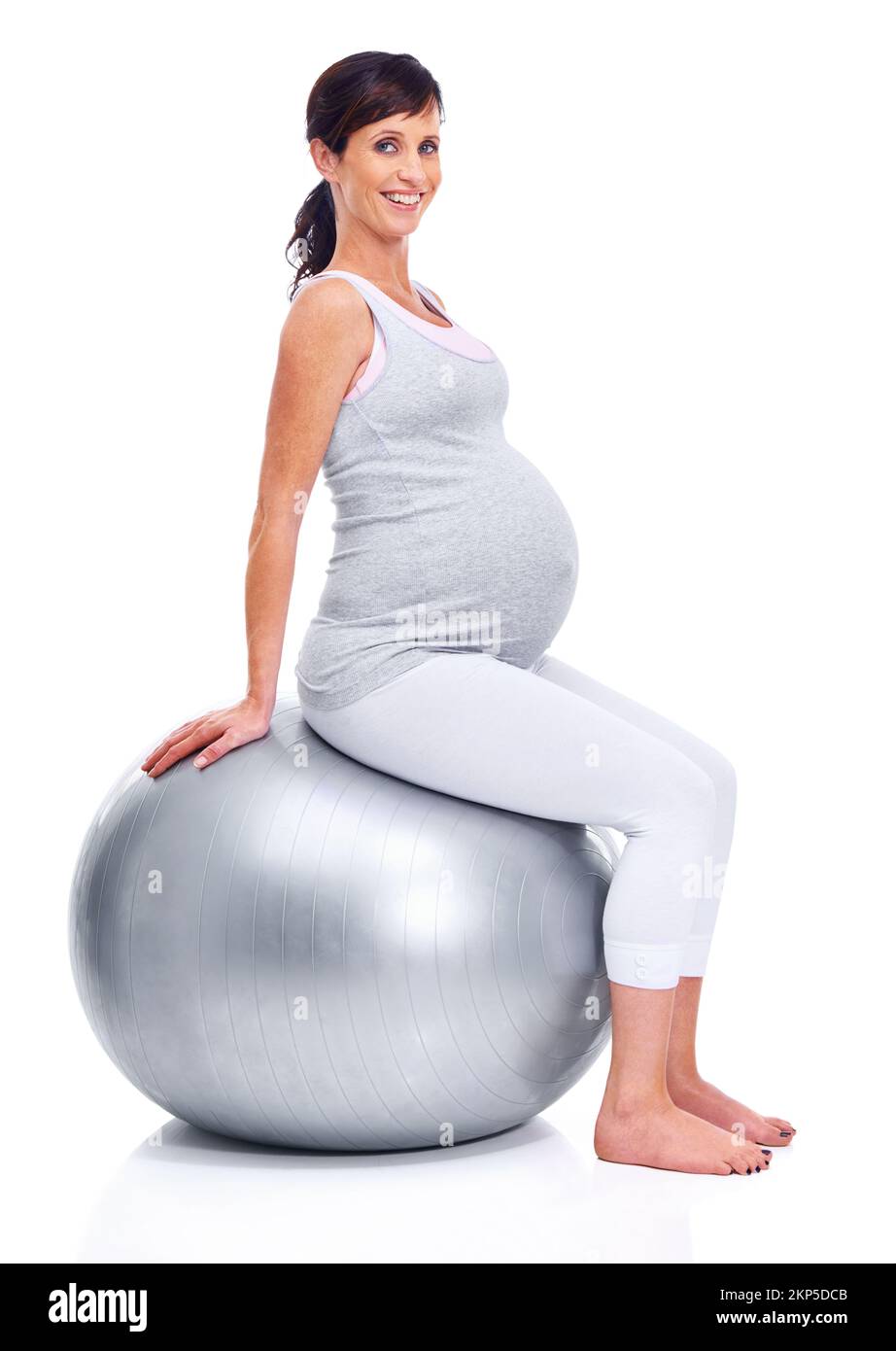 Keeping in shape, right down to her final trimester. A pregnant mother ...