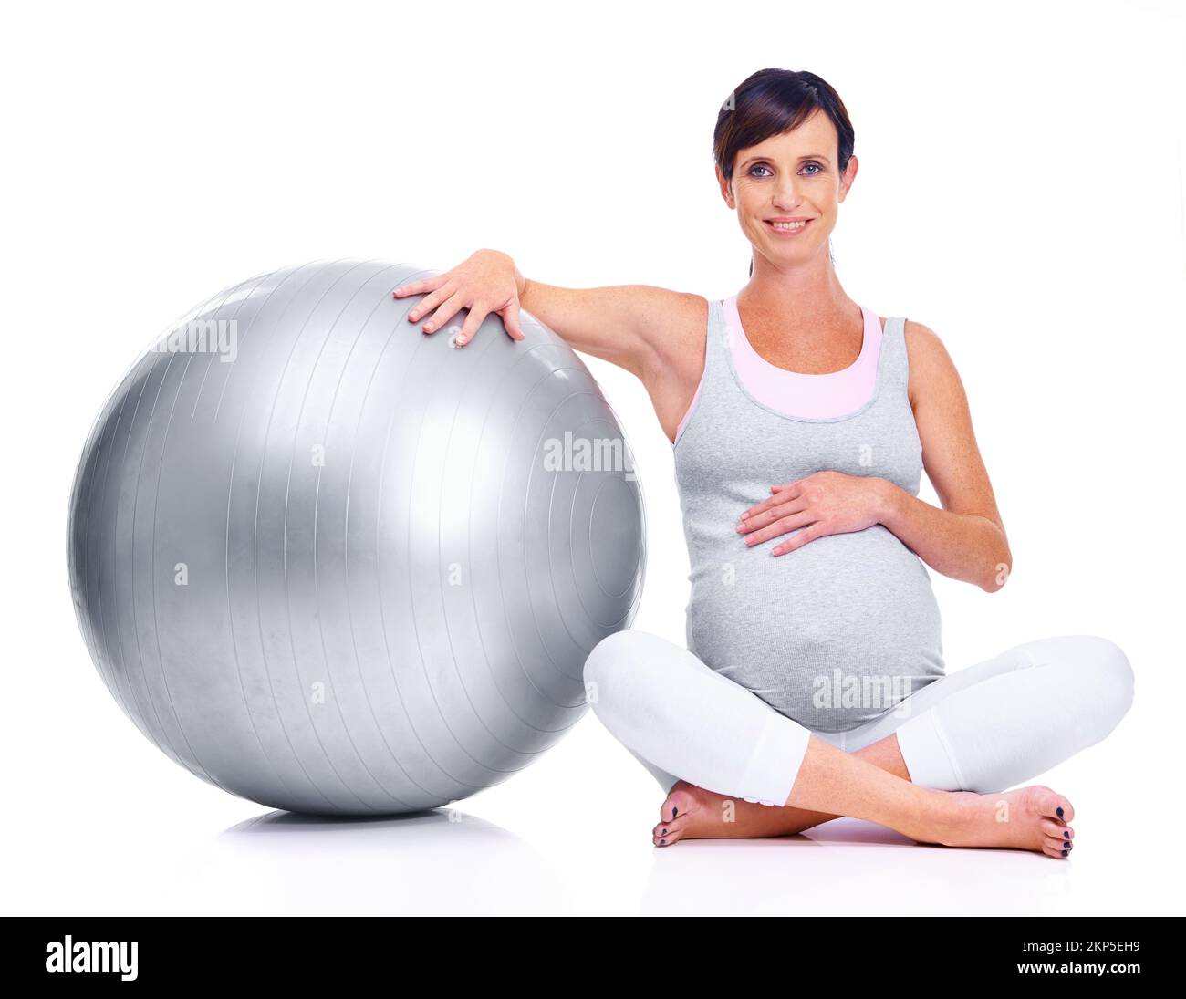Keeping in shape, right down to her final trimester. A pregnant mother ...