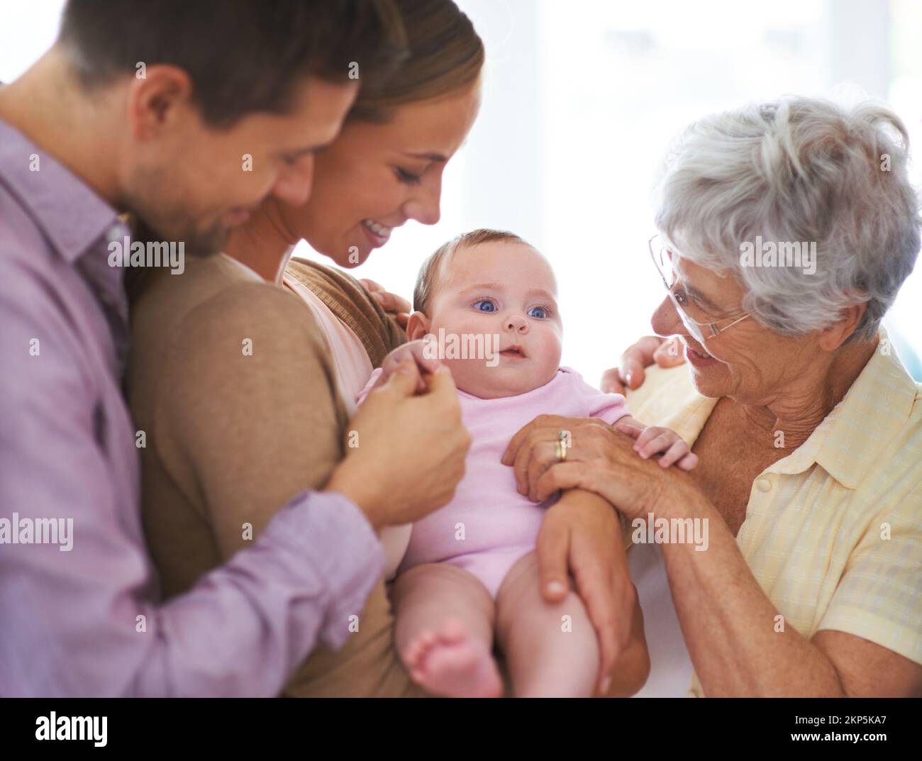 Born into a love-filled family. a happy grandmother meeting her ...