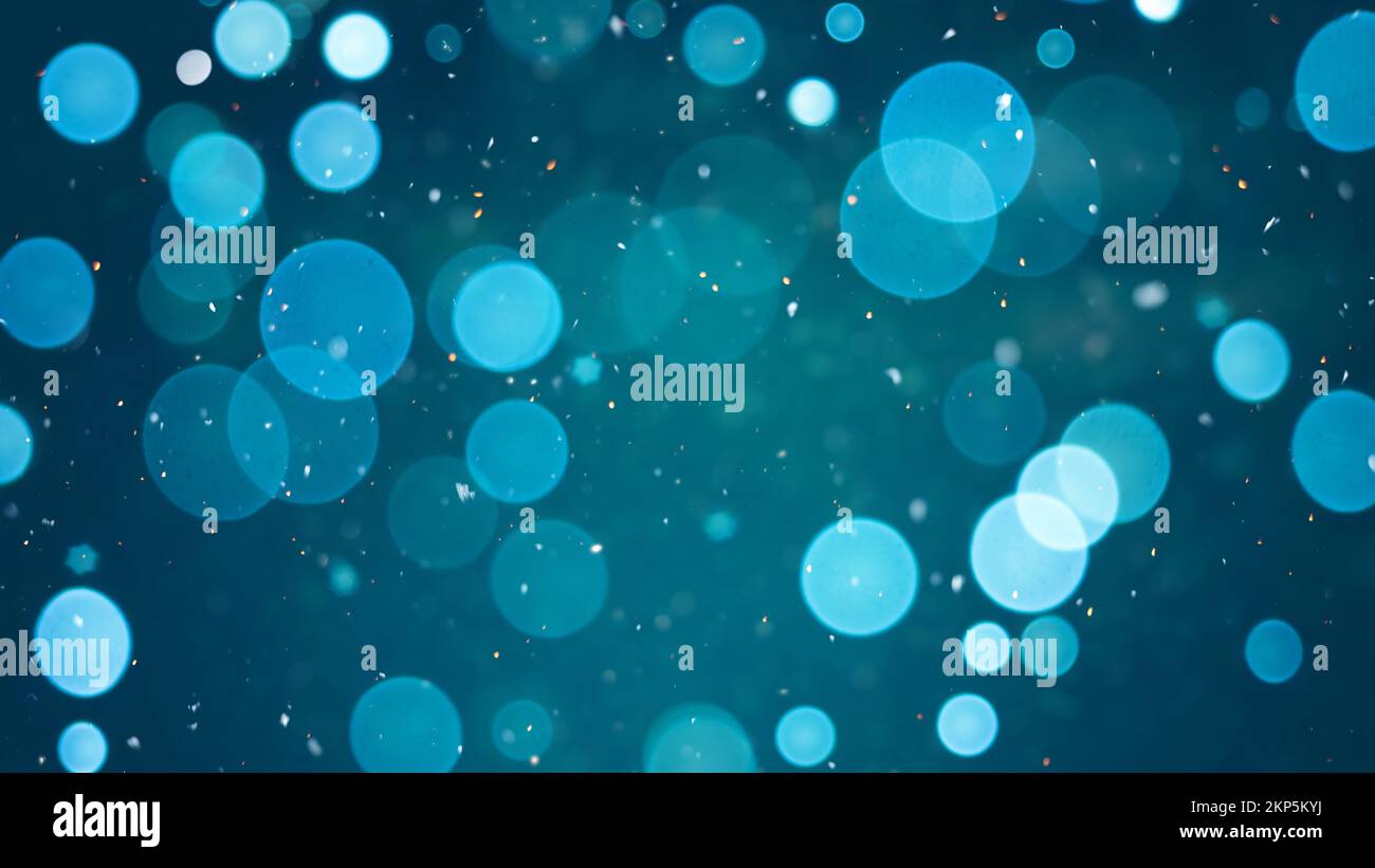 Blue - green teal color bokeh lights with snow texture. Christmas and ...