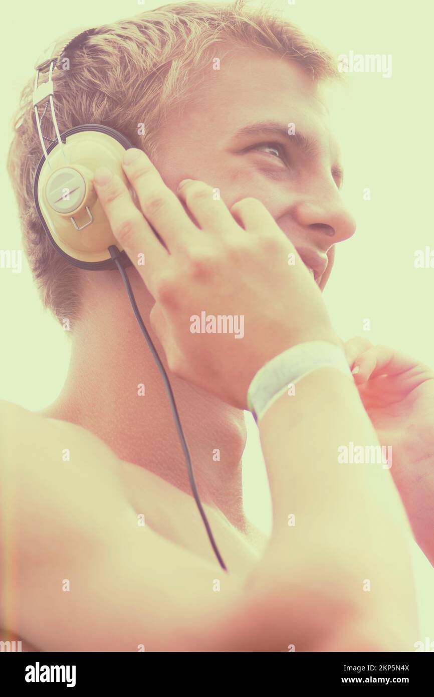 Teen boy listening music sun hi-res stock photography and images - Alamy