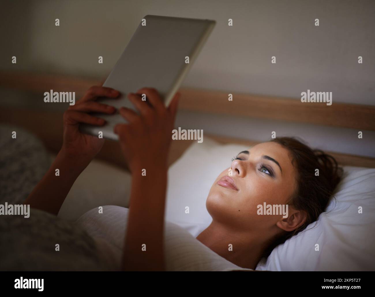 Woman in bed night using hi-res stock photography and images - Alamy