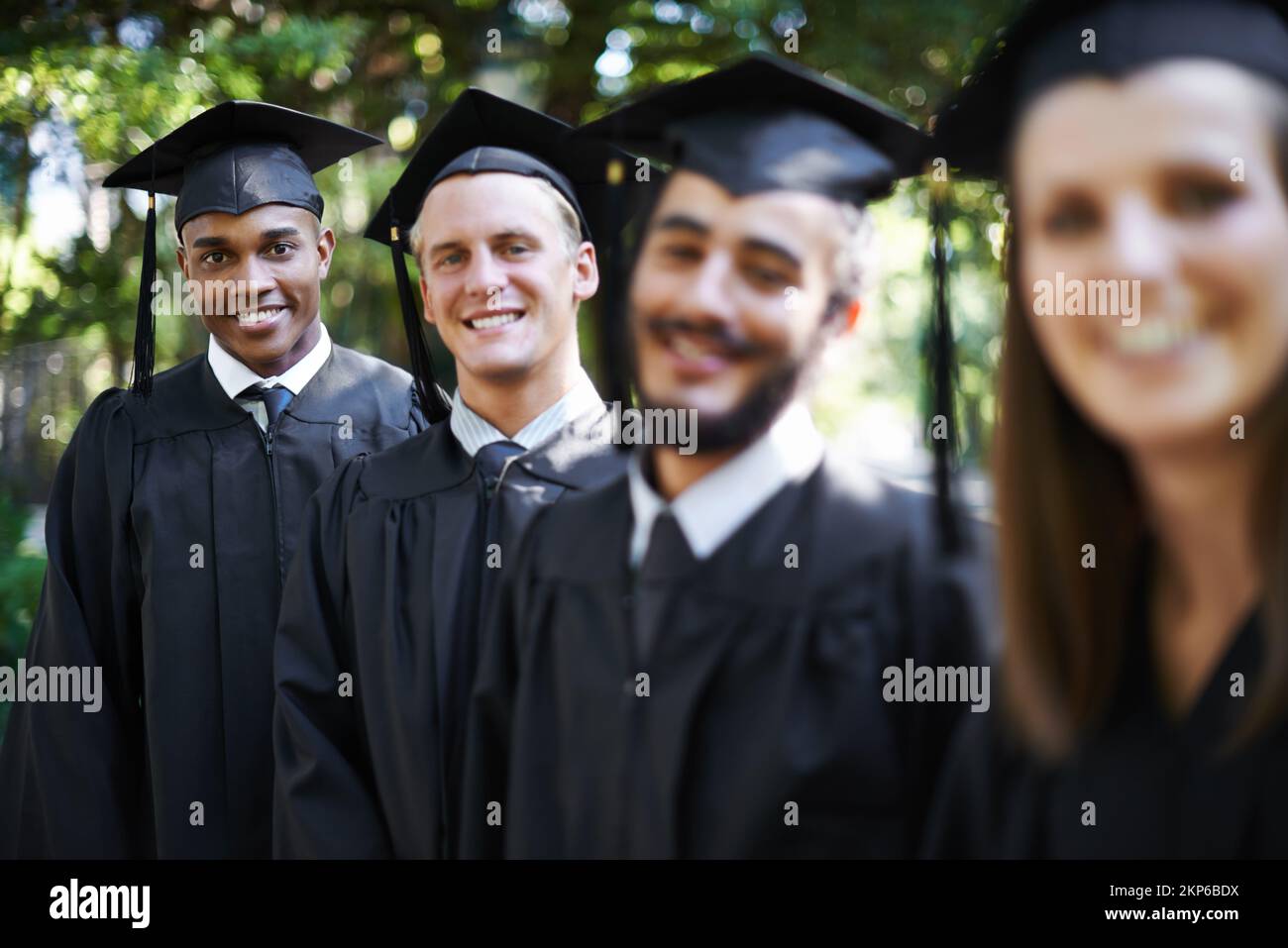 Theyre proud graduates. Portrait of a group of happy students on ...