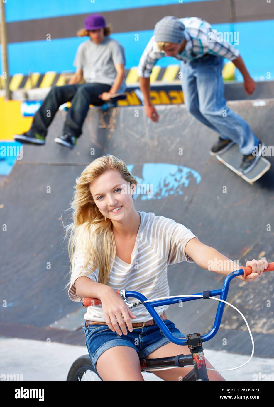 Chilling at the skatepark. a teenage girl at a skatepark Stock Photo ...