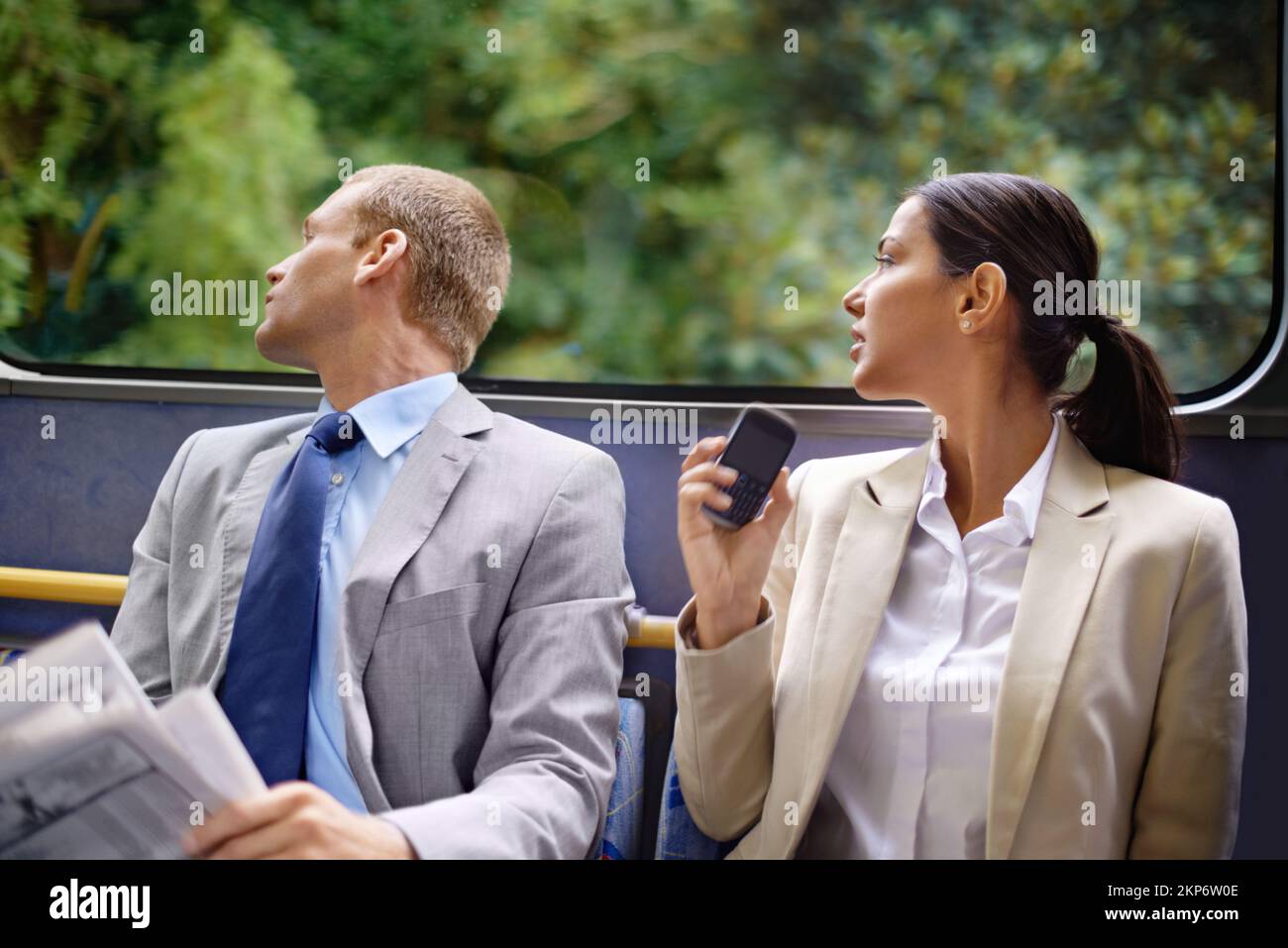 Is this our stop. young business people commuting to work Stock Photo ...