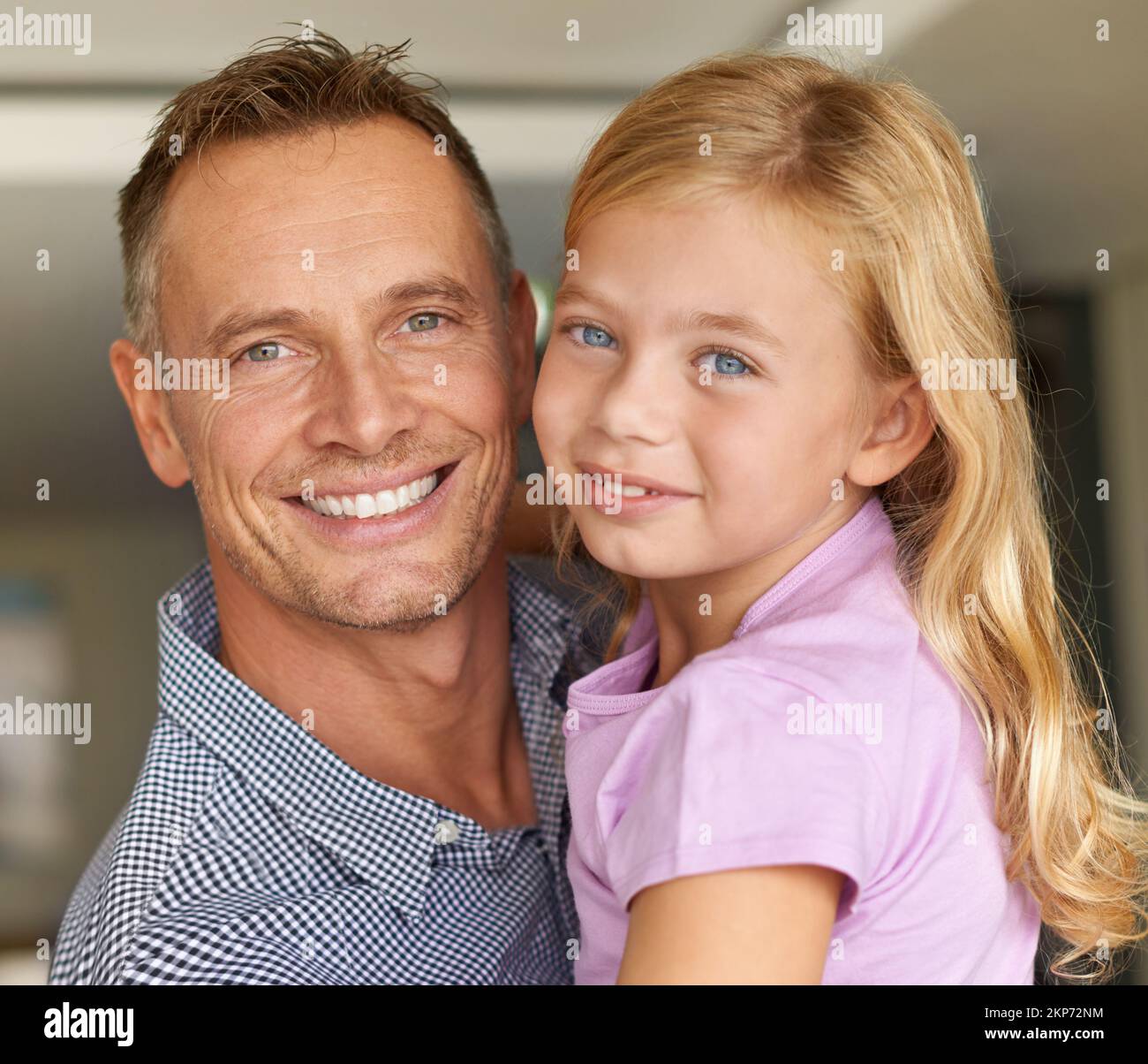 She comes first in my life. Portrait of a loving father carrying his ...