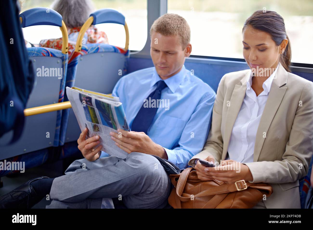Bus reading newspaper hi-res stock photography and images - Alamy
