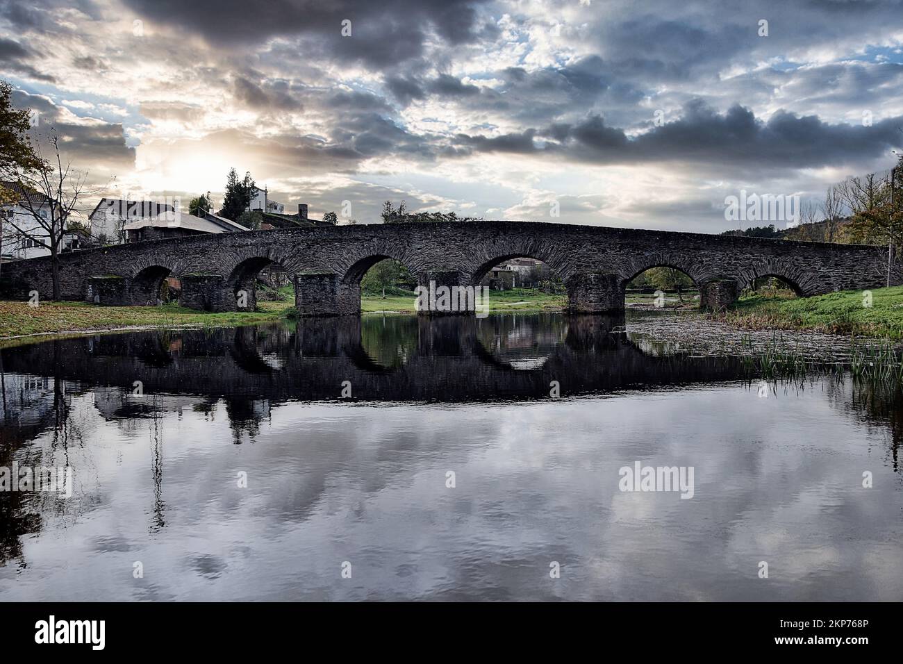 An aerial view of stony bridge over lake in Braga during sunset Stock ...