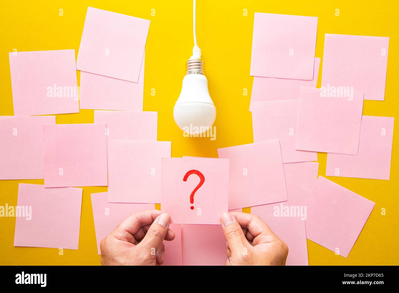 The process of problem solving. Question mark and light bulb on yellow ...