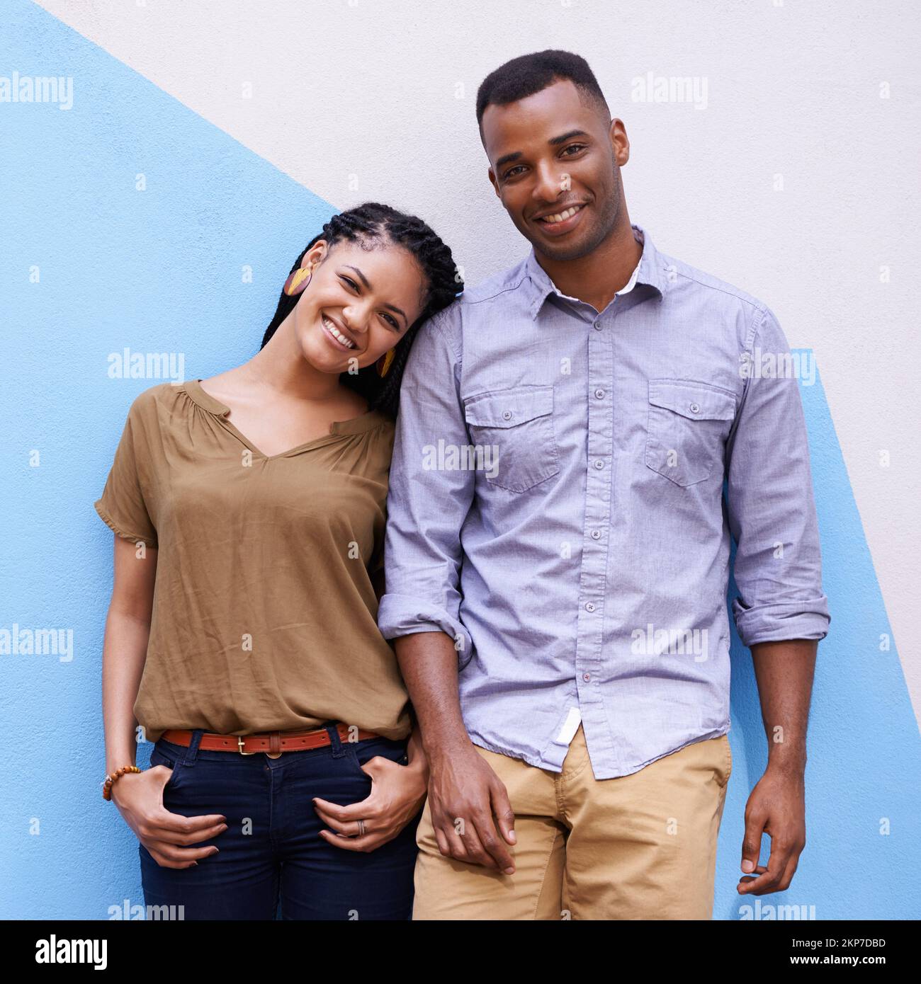 Theyve got a good thing going...Portrait shot of a young couple leaning ...