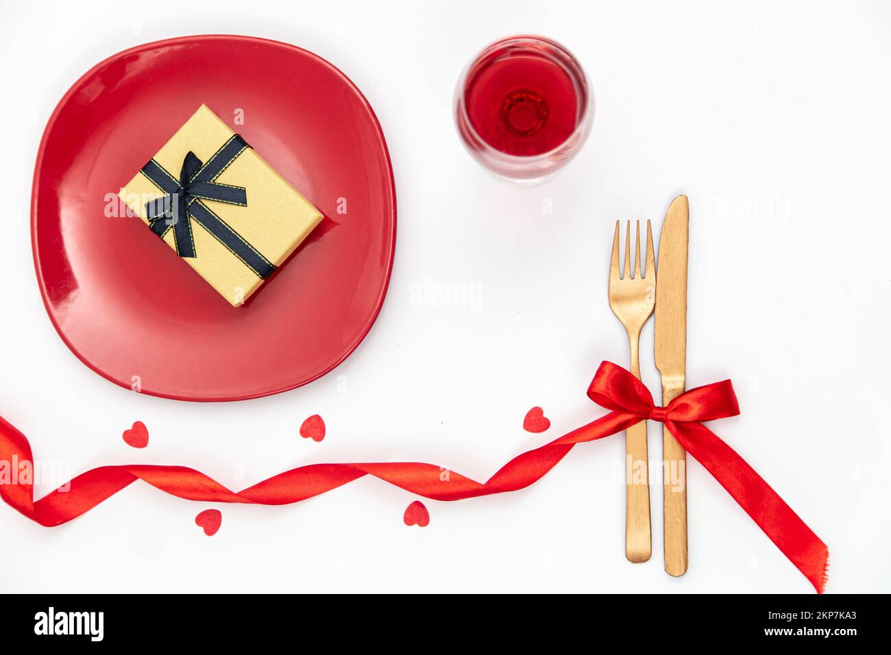 Serving a romantic dinner on a white background isolated, top view ...
