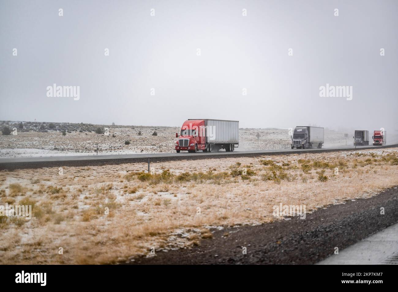 Convoy of industrial big rigs semi trucks with semi trailers ...