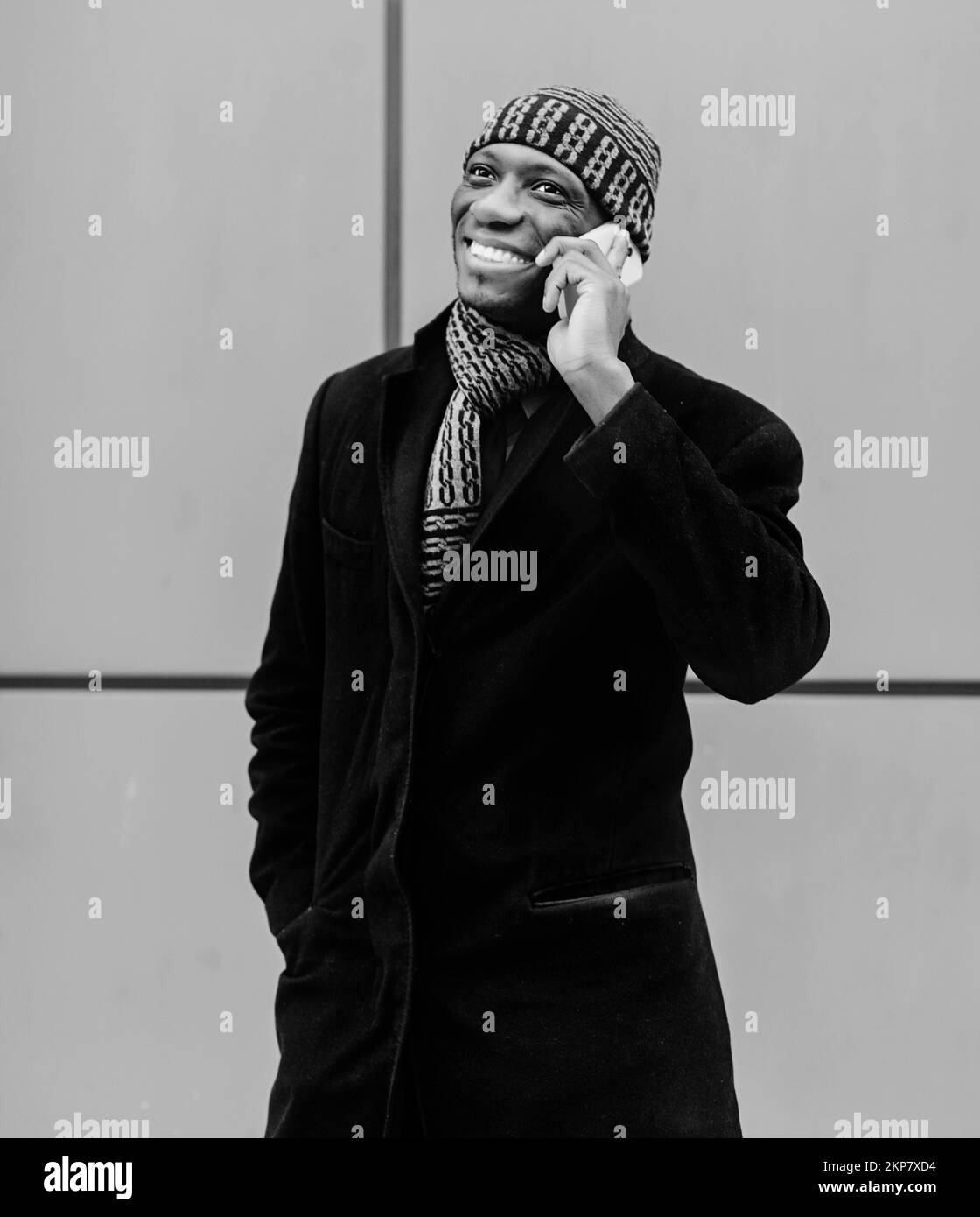 happy young black african man talking on the phone Stock Photo - Alamy