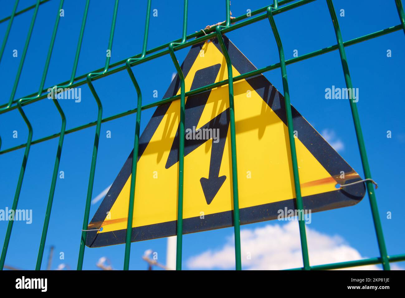 Electrical hazard sign placed on a metal fence Stock Photo - Alamy