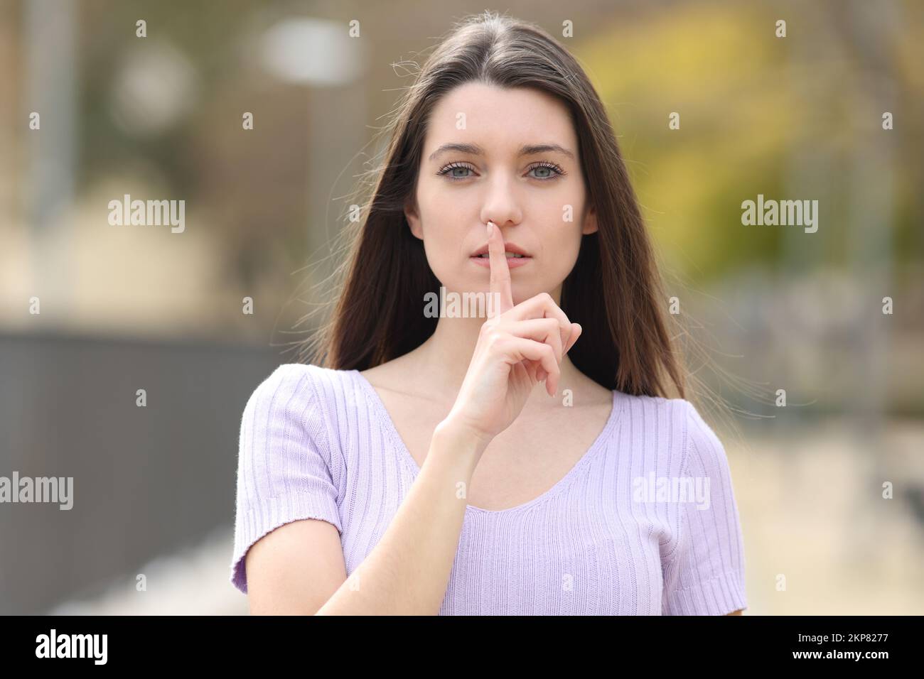 Woman requesting silence hi-res stock photography and images - Alamy