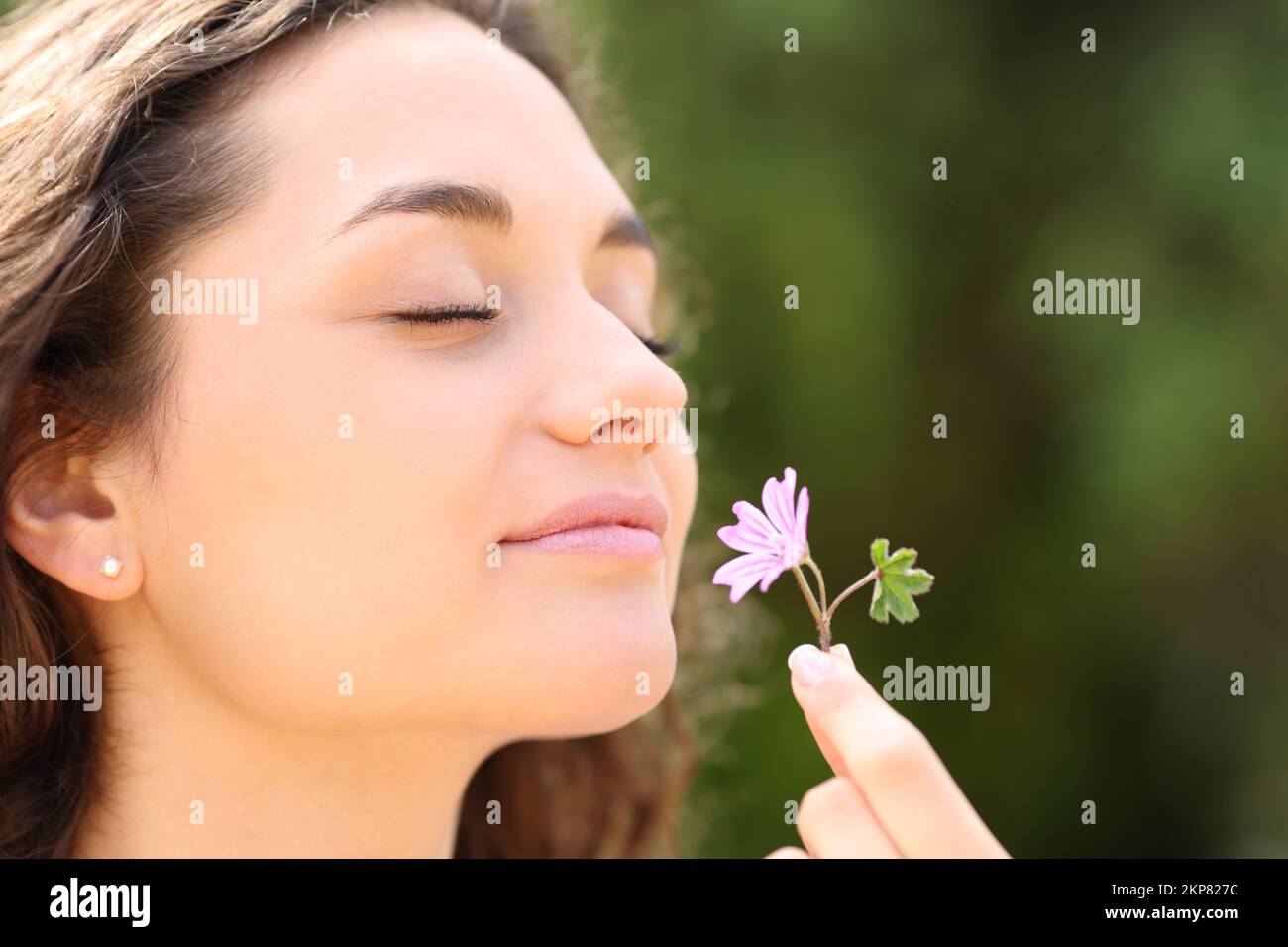 Woman hold flower hi-res stock photography and images - Alamy