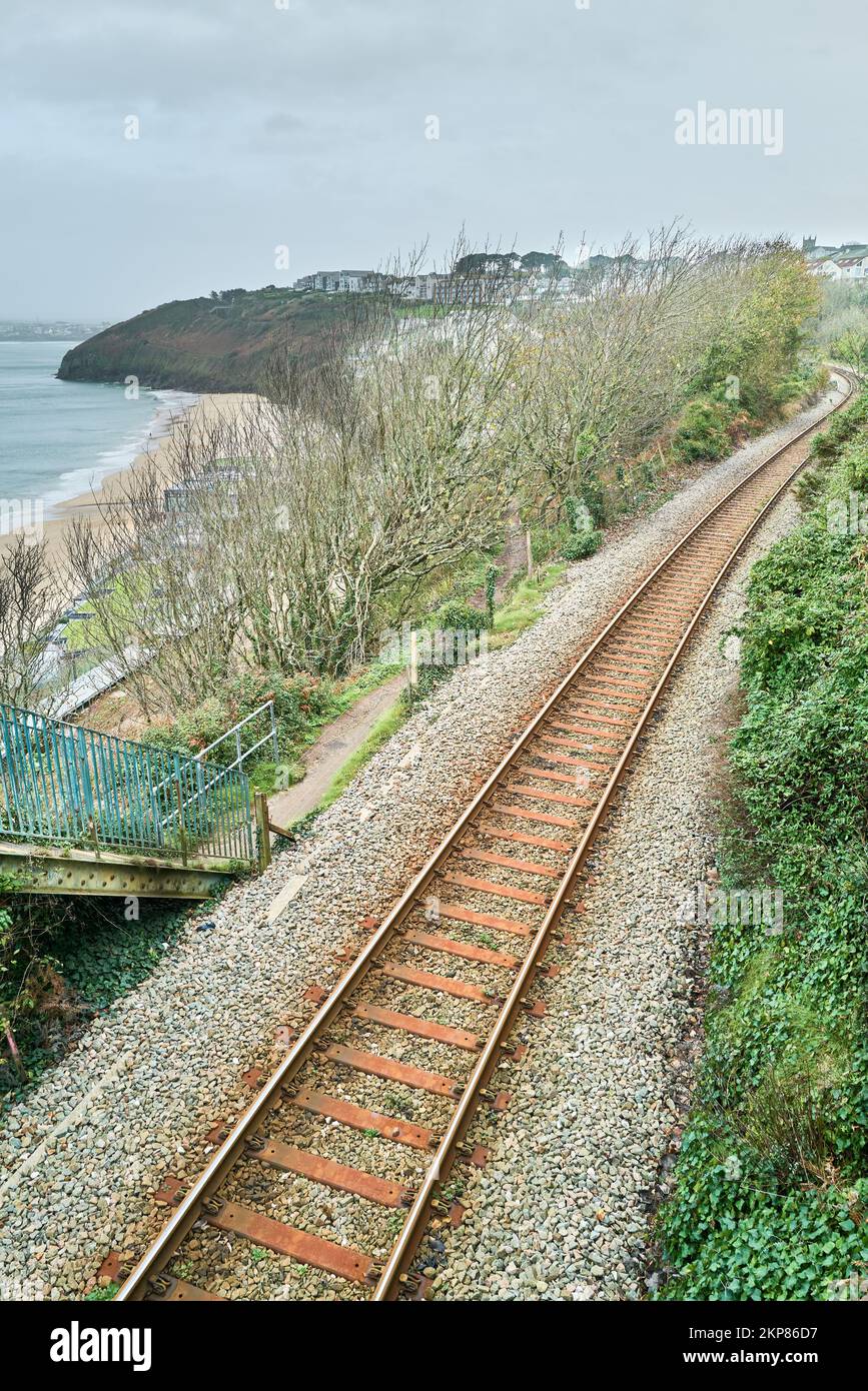 Single track railway line along the coast between St Ives and St Erth ...