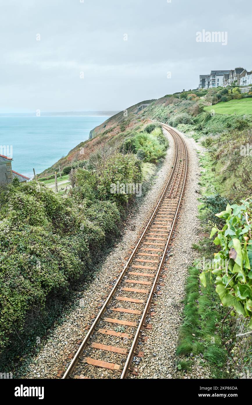 Single track railway line along the coast between St Ives and St Erth ...