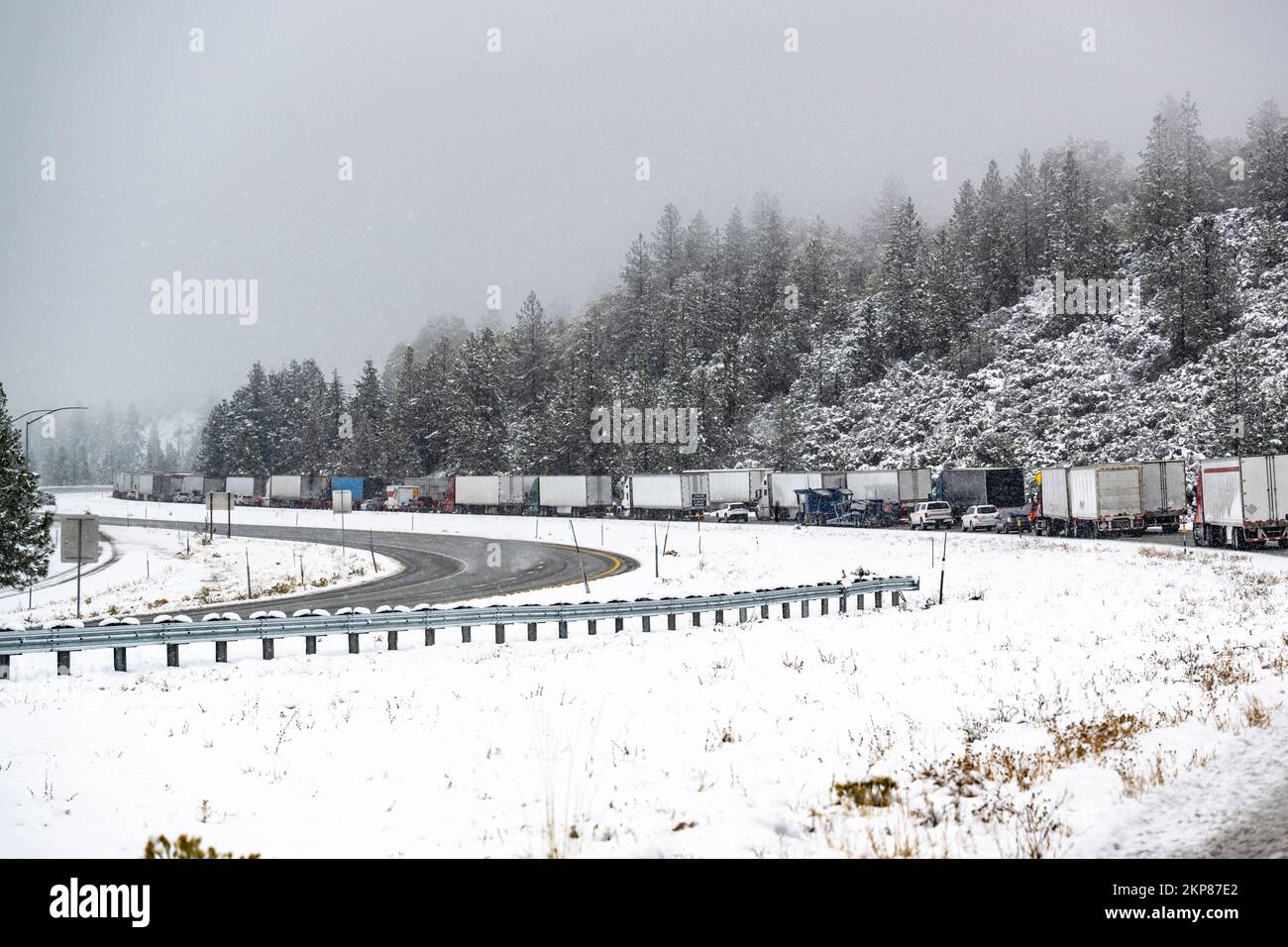 Convoy of industrial big rigs semi trucks with semi trailers ...