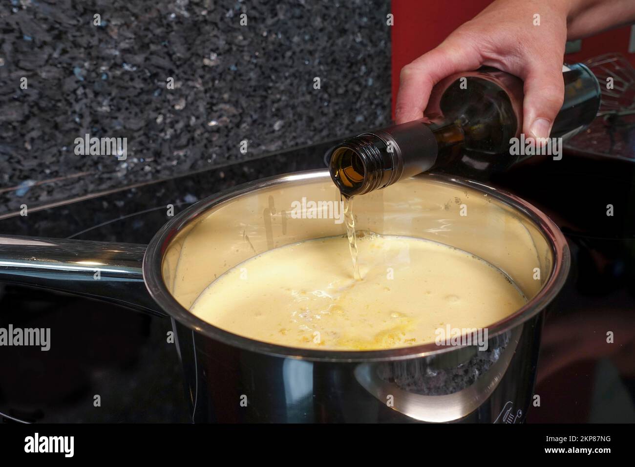 Swabian cuisine, preparation of Stuttgart Riesling cake, pouring white ...