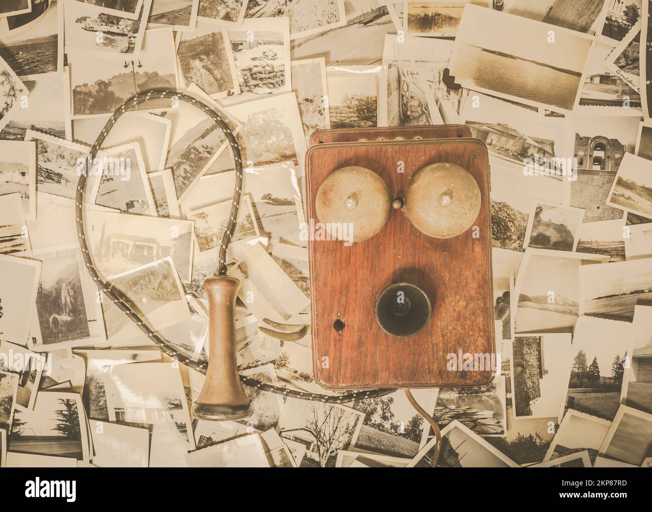 Antique old-fashioned still life on a bell box telephone with ...