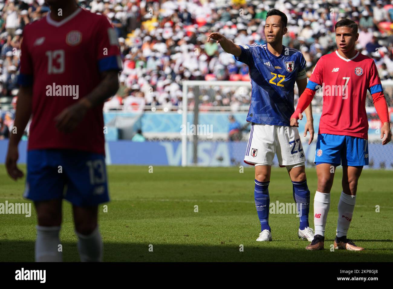 Maya Yoshida (22) of Japan and Anthony Contreras (7) of Costa ...