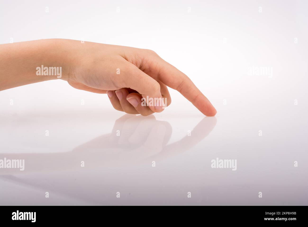 Hand pointing on a white background Stock Photo - Alamy
