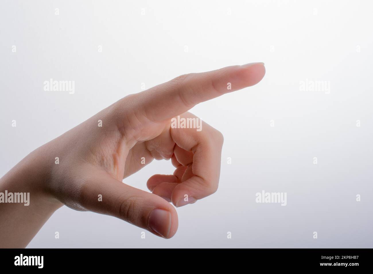 Hand pointing on a white background Stock Photo - Alamy