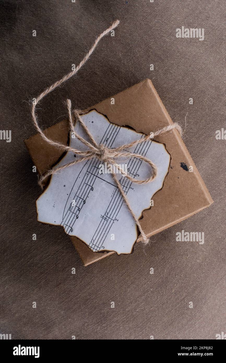 Musical notes on a burnt paper on a brown background Stock Photo - Alamy