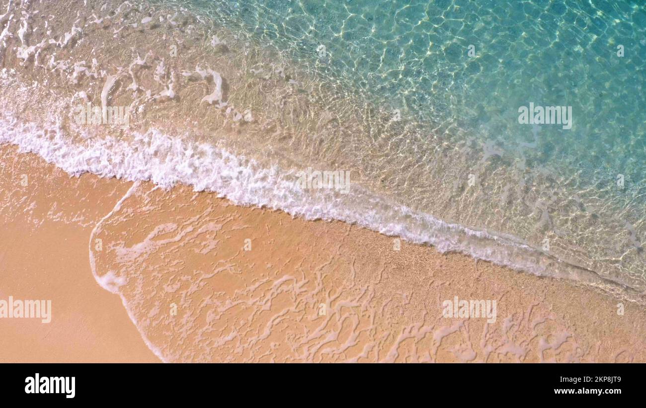 Clear calm water seashore washing hi-res stock photography and images ...