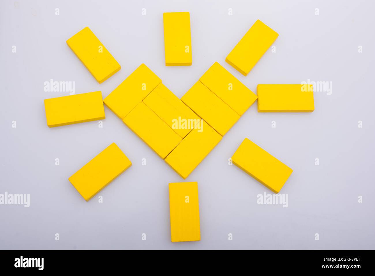 Colorful domino pices are forming a Sun shape Stock Photo - Alamy