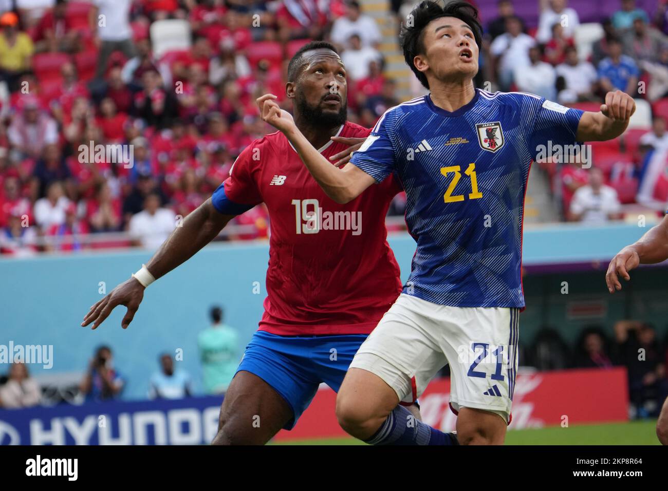 Kendall Waston (19) of Costa Rica and Ayase Ueda (21) of Japan during ...