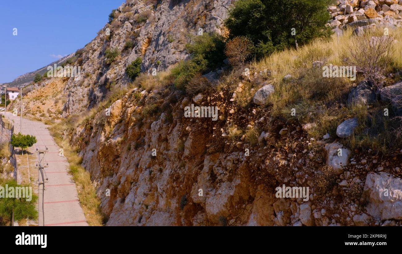 Wildlife close-up. Path in the mountains. Mountain rock and wild ...