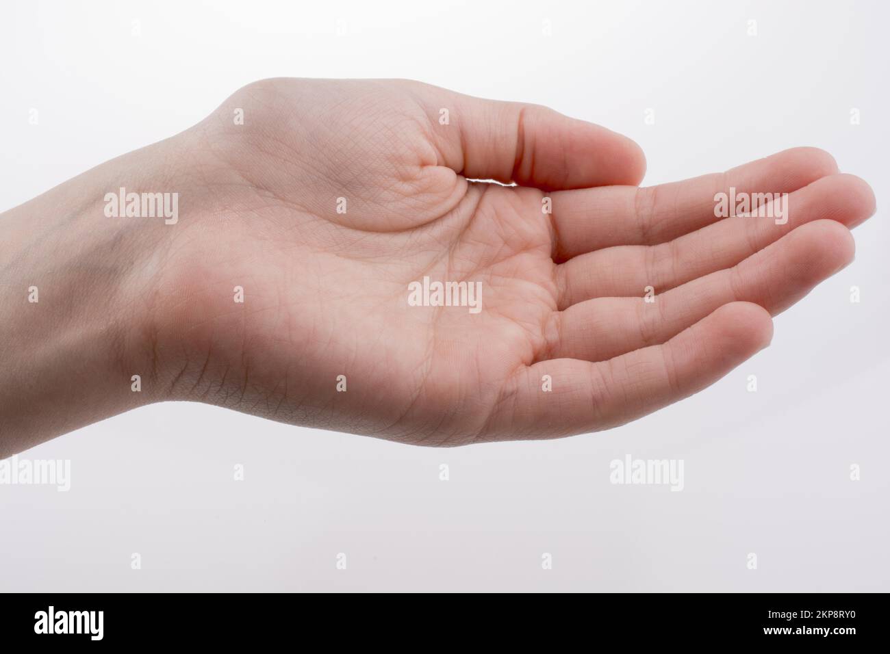 Human hand on a white background Stock Photo - Alamy