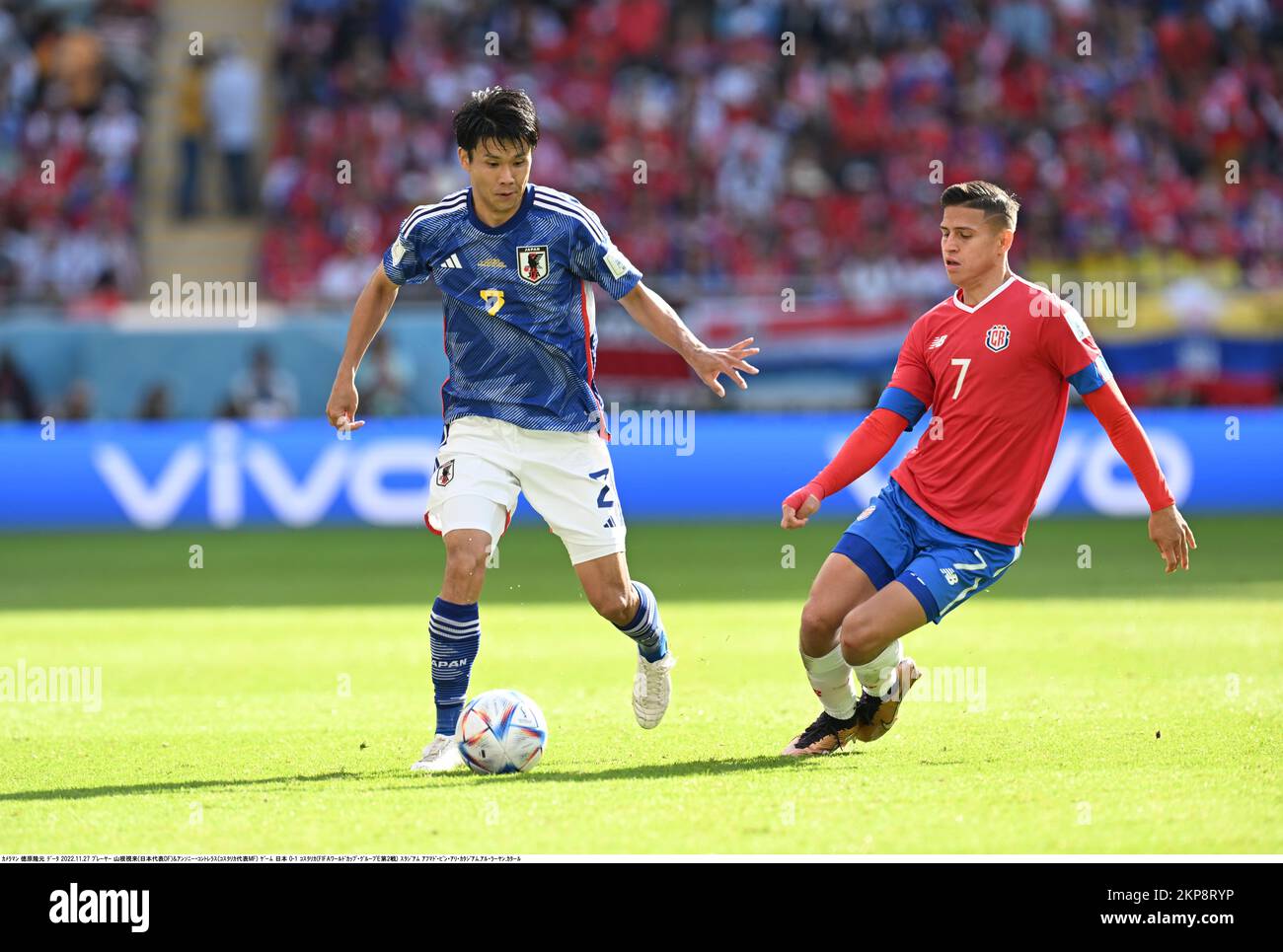 Miki Yamane (2) of Japan and Anthony Contreras (7) of Costa Rica during the FIFA World Cup Qatar ...
