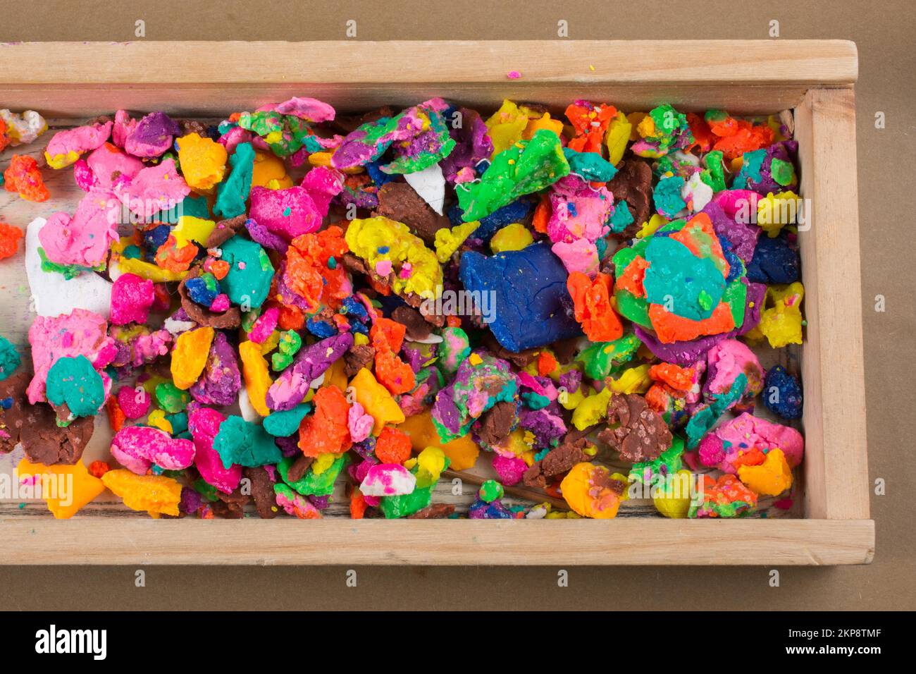 Dry colorful play dough in smal pieces Stock Photo - Alamy