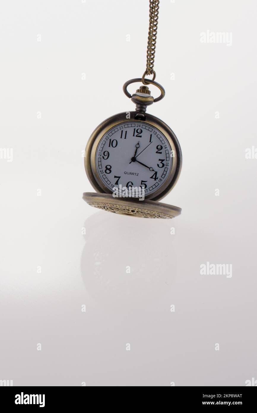 Isolated retro styled pocket watch on white background Stock Photo - Alamy