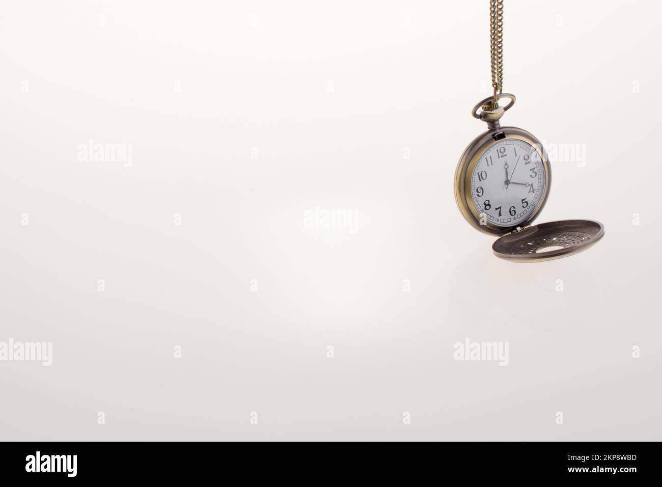 Isolated retro styled pocket watch on white background Stock Photo - Alamy