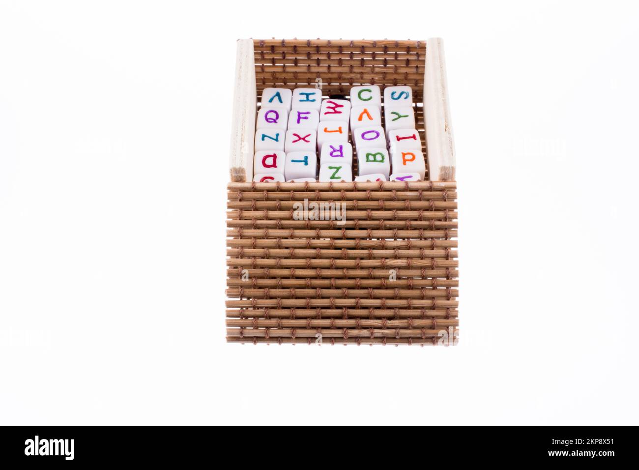 Letter cubes placed in a box on a white background Stock Photo - Alamy