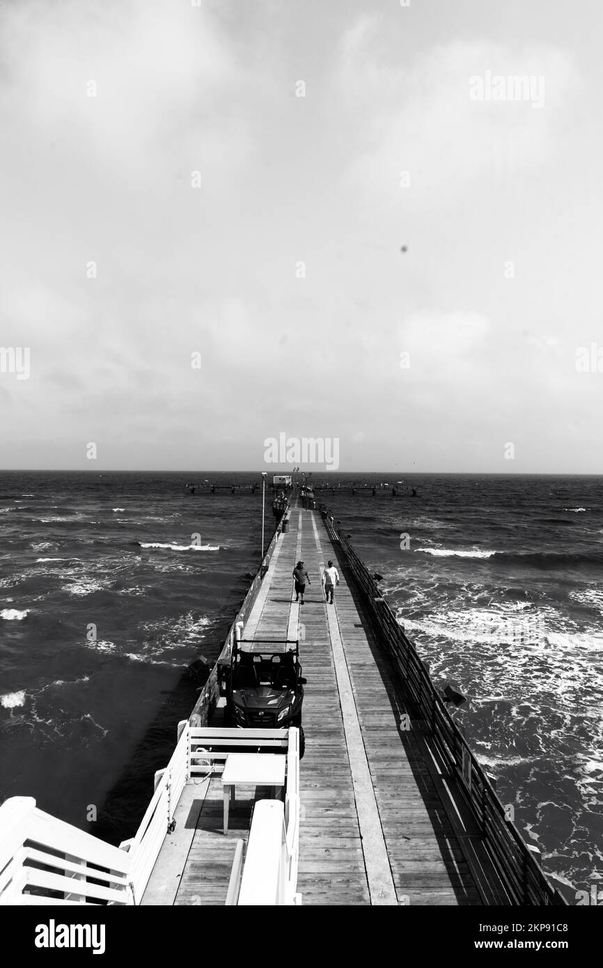 An aerial view of wooden dock surrounded by water Stock Photo - Alamy