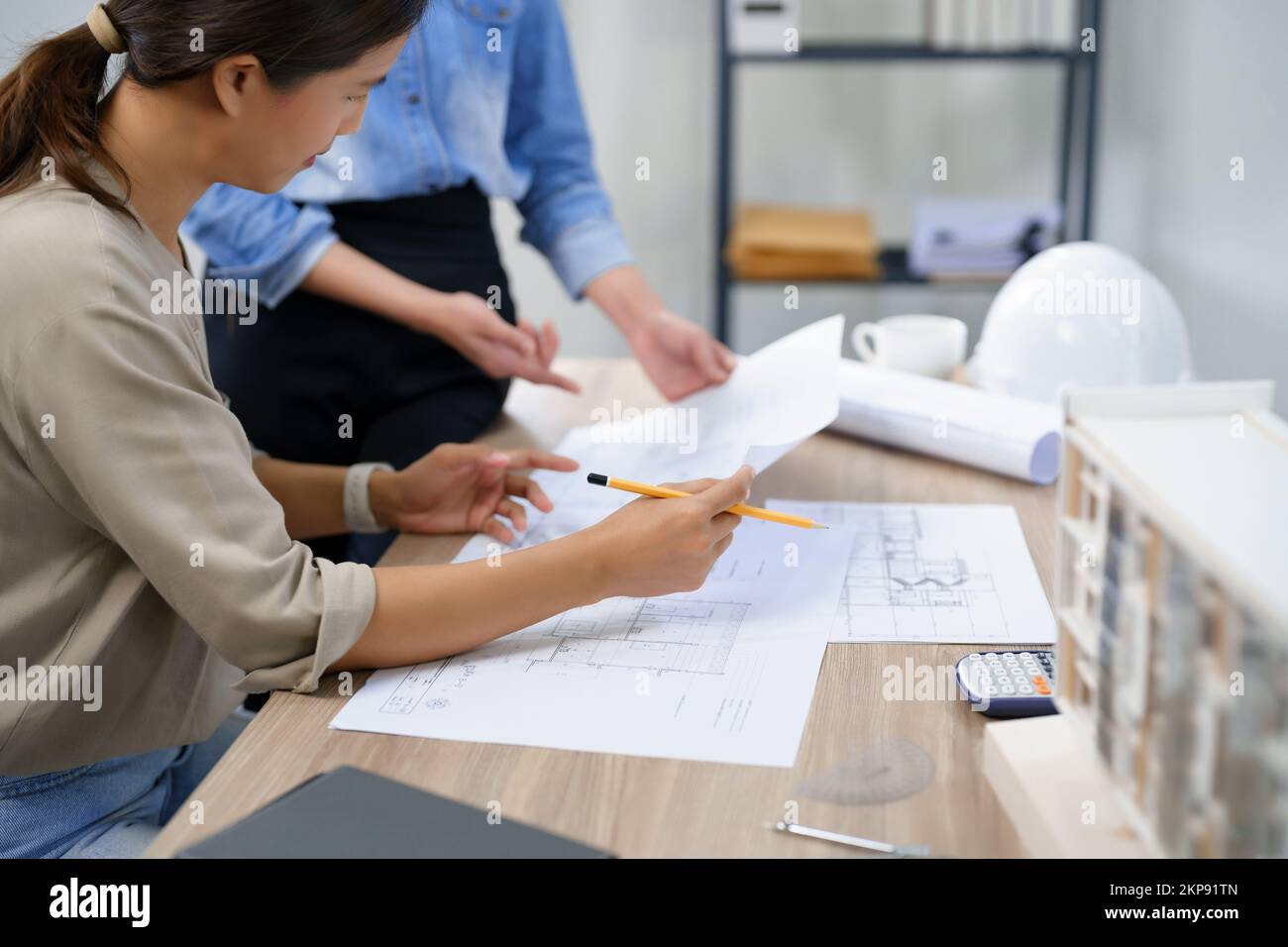 Engineering construction concept, Two female engineers brainstorming ...
