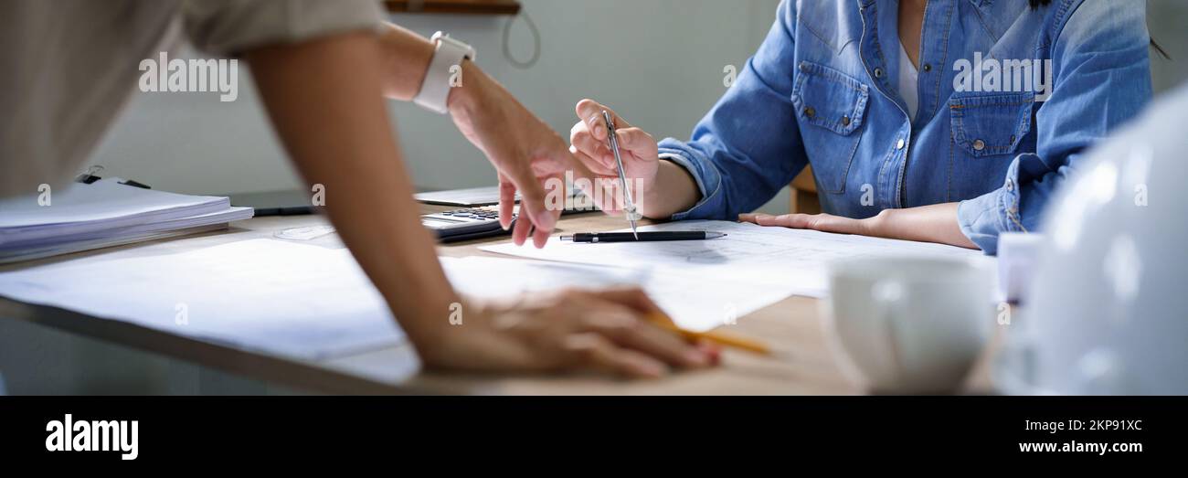 Engineering construction concept, Female engineer use geometry compass ...