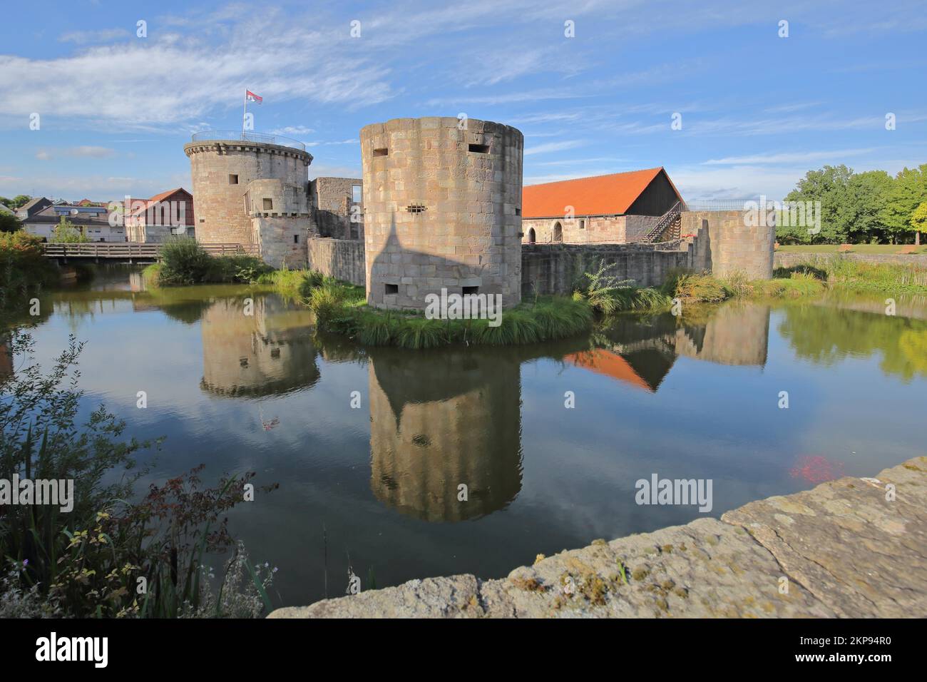 Historic medieval moated castle, fortification, bulwark, towers ...