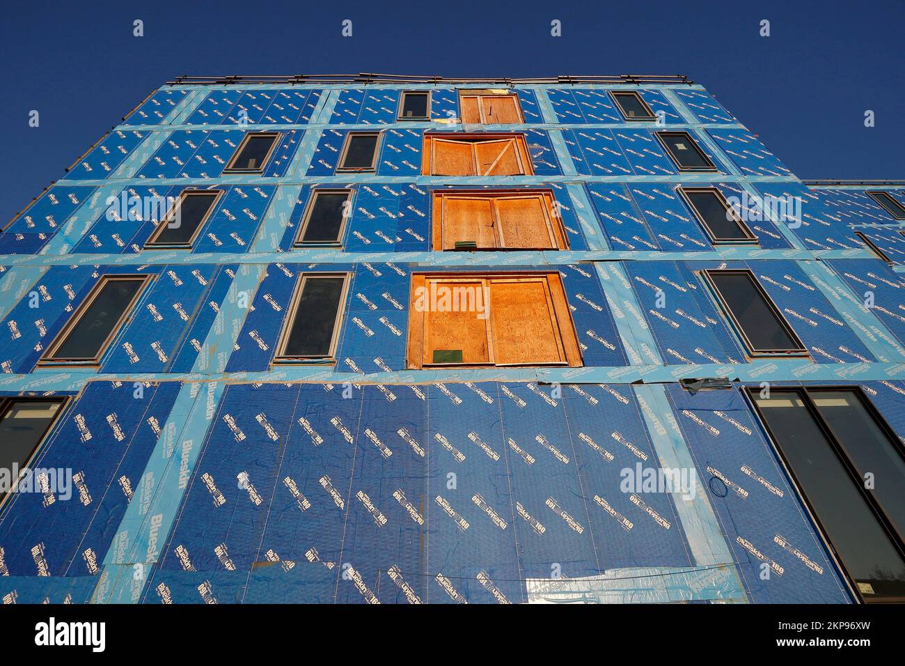 Building construction with blue isolation, Montreal, Province of Quebec ...