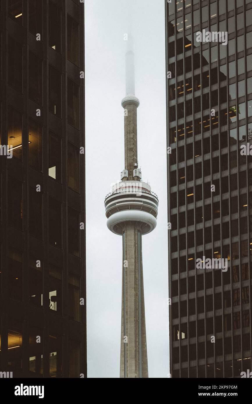 The CN Tower between two buildings Stock Photo - Alamy