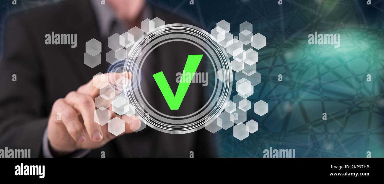 Man touching a validation process concept on a touch screen with his ...